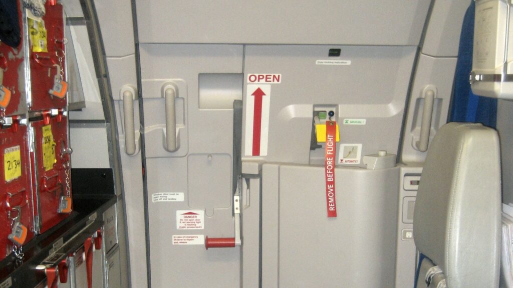 Why Pilots Say It’s Impossible to Open a Plane Door Mid-Flight ...